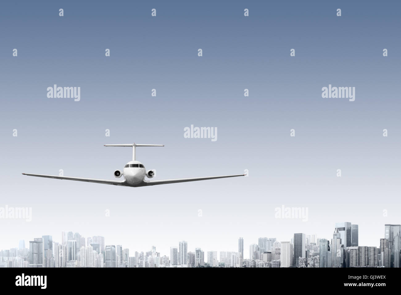 Aeroplane flying above buildings High Resolution Stock Photography and ...