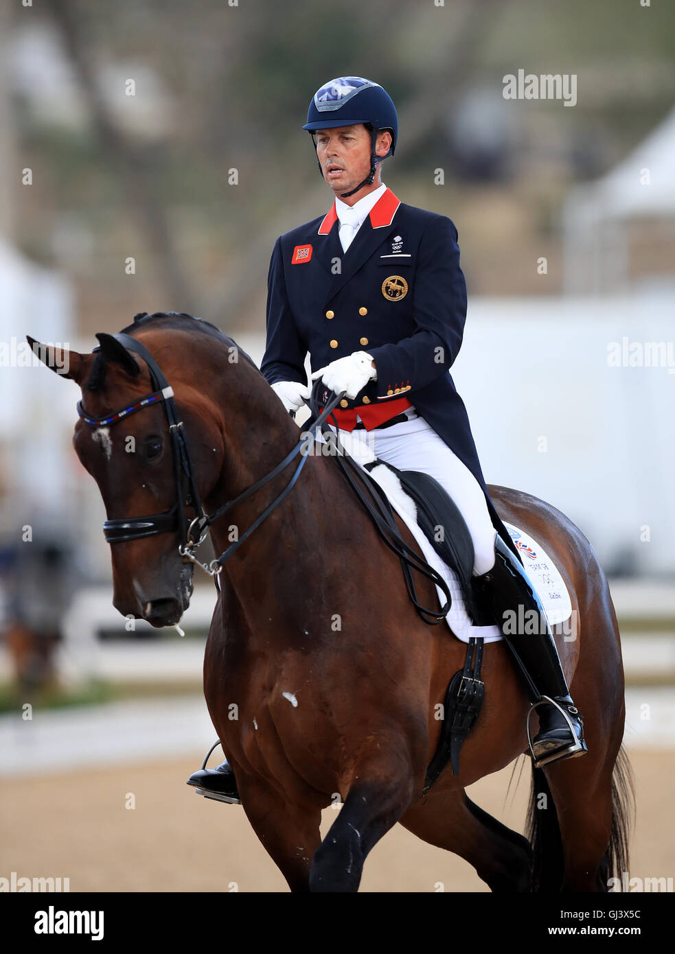 Great Britain's Carl Hester riding Nip Tuck during the Dressage Team ...