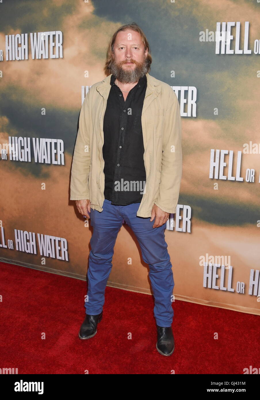 HOLLYWOOD, CA - AUGUST 10: Director David Mackenzie arrives at the ...