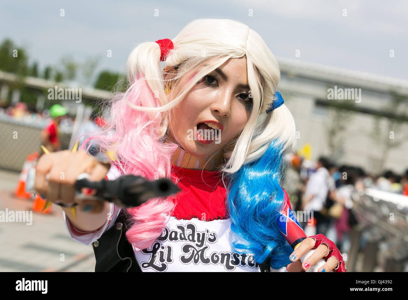 Tokyo, Japan. 12th August, 2016. A cosplayer poses for a photograph ...