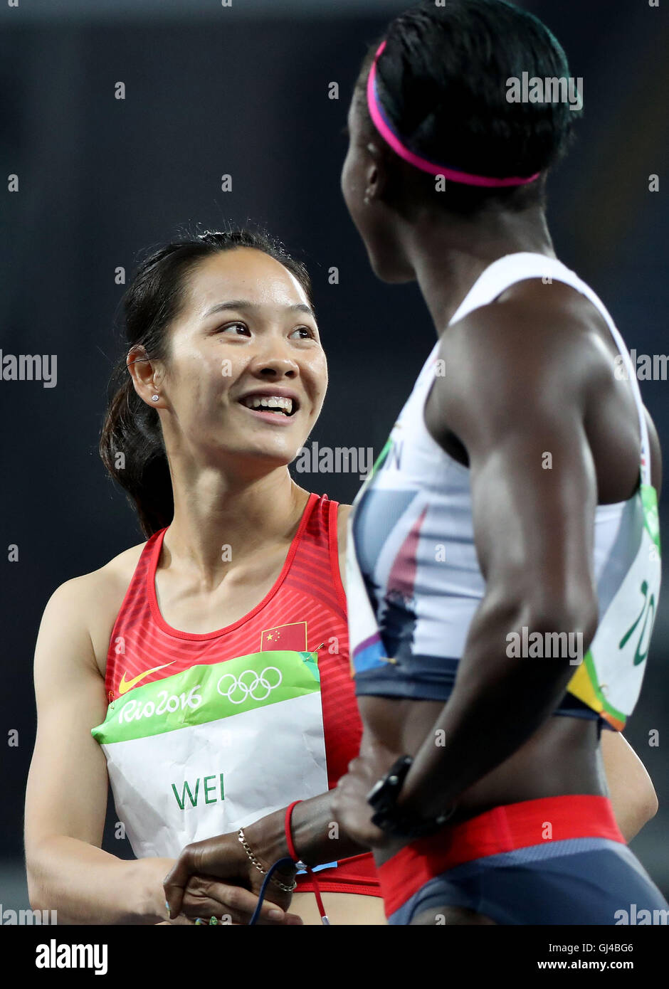 Rio De Janeiro, Brazil. 12th Aug, 2016. Wei Yongli (L) of China reacts ...