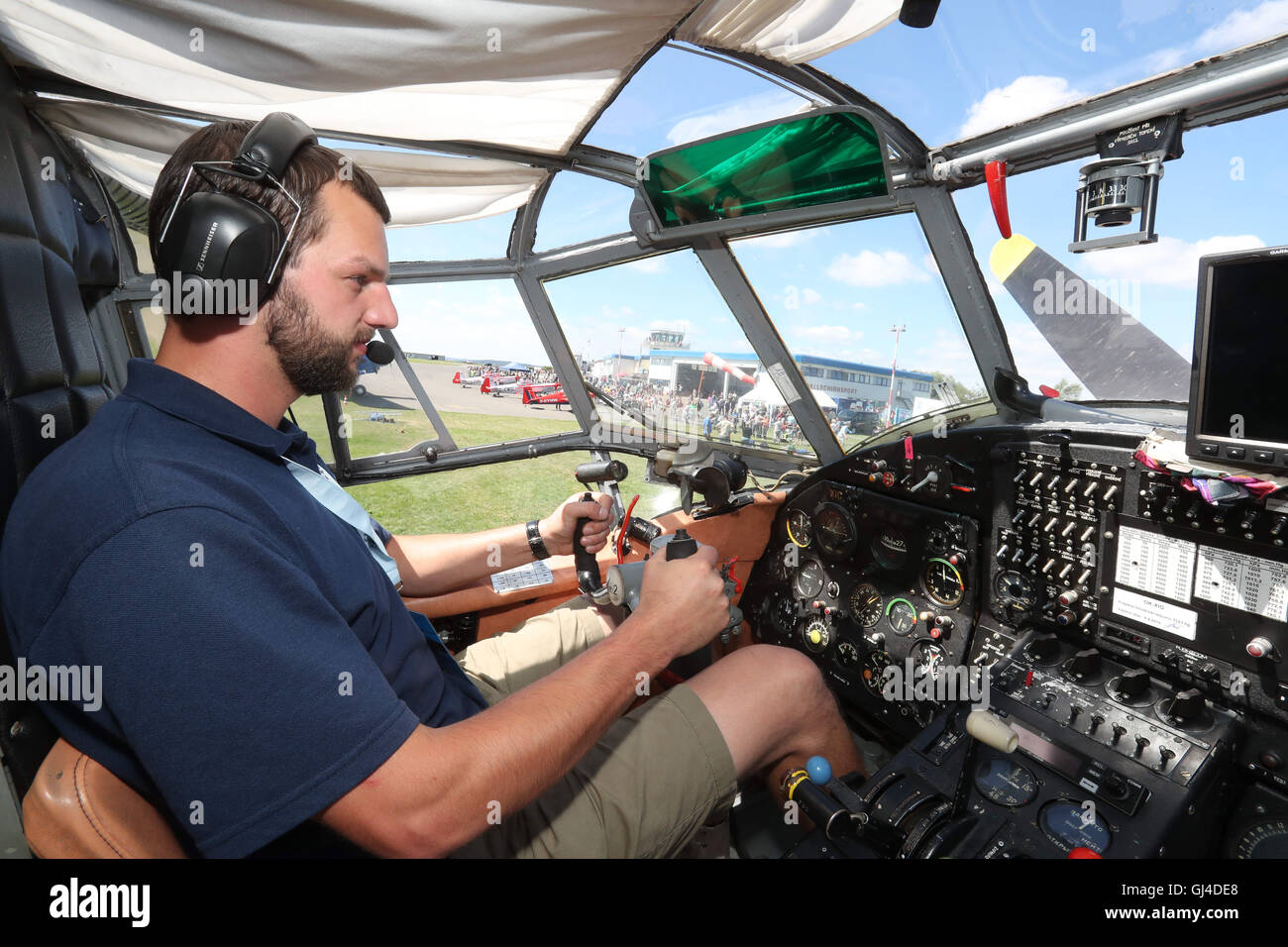 Gera, Germany. 13th Aug, 2016. Pilot Martin Vysohy in his AN 2 at the ...