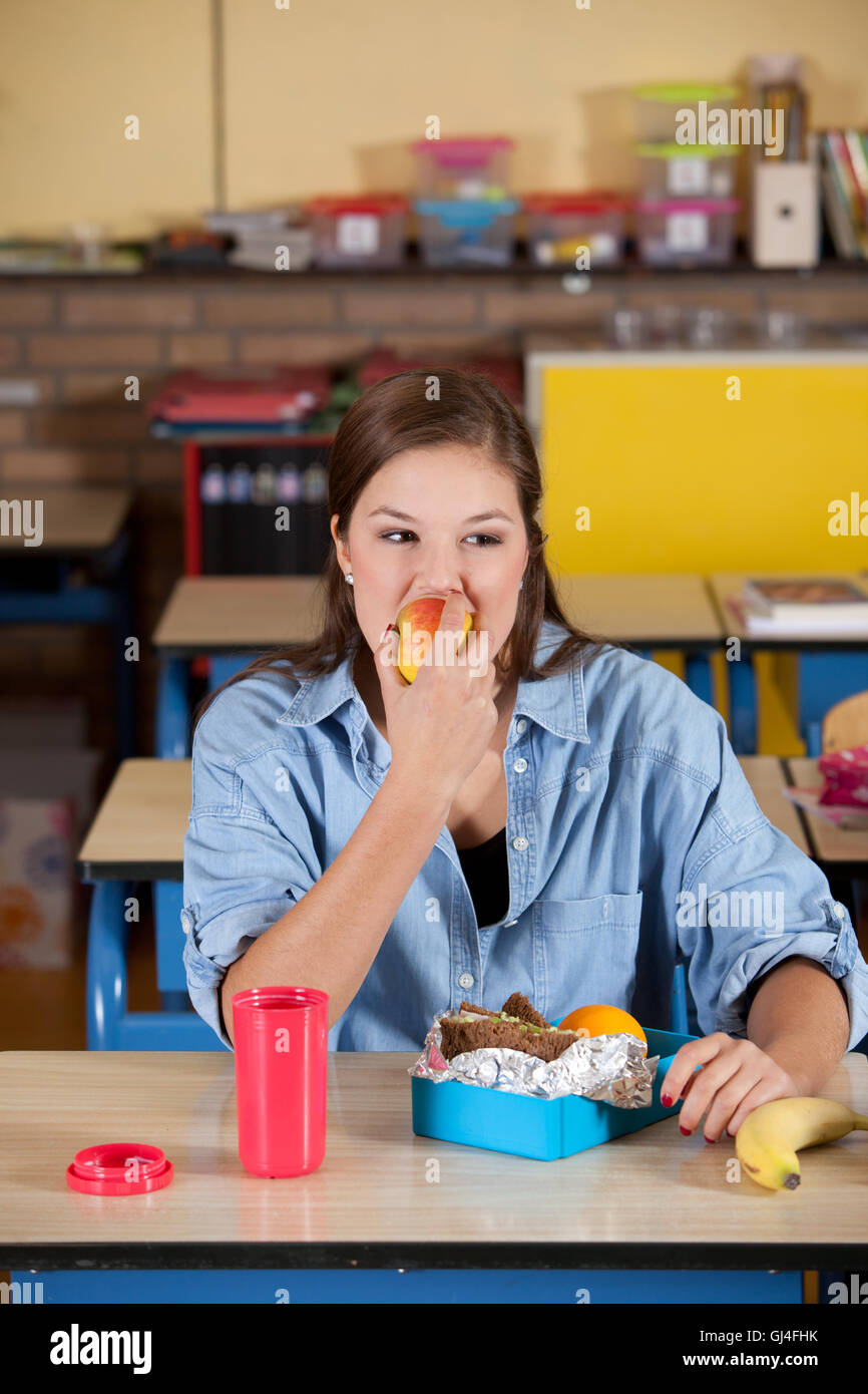Eating an apple Stock Photo - Alamy