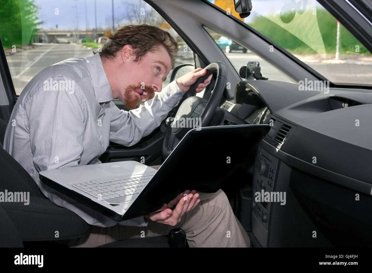 driver using GPS laptop Stock Photo - Alamy