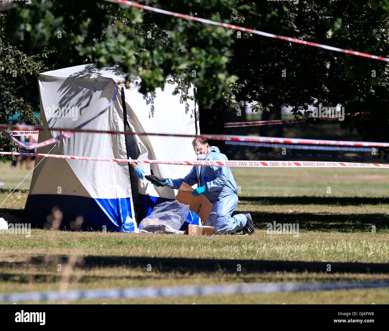 Police forensic officers outside a police tent in Hyde Park, London ...