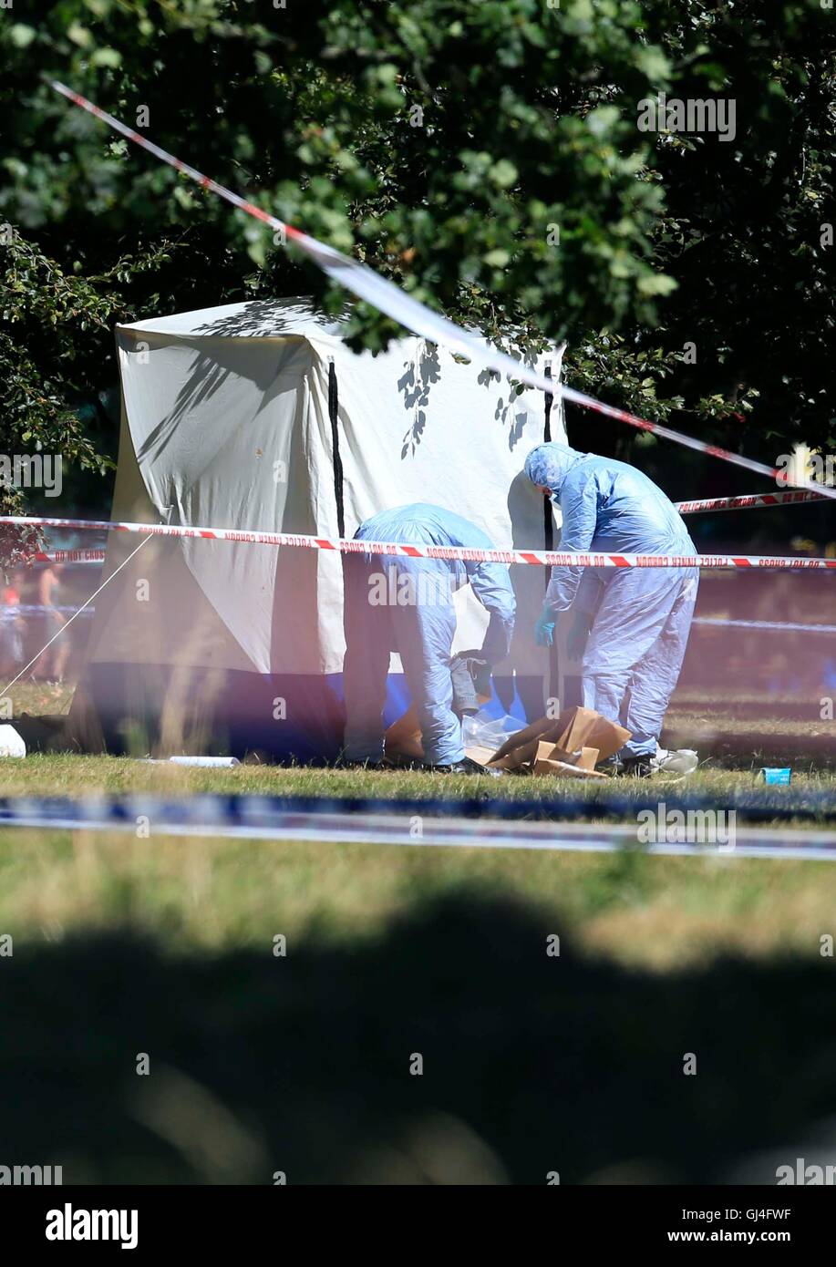 Police forensic officers outside a police tent in Hyde Park, London ...