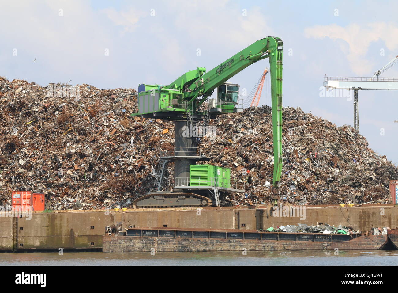 Crane with grab claw at scrap metal recycling yard, Hamburg Stock Photo ...