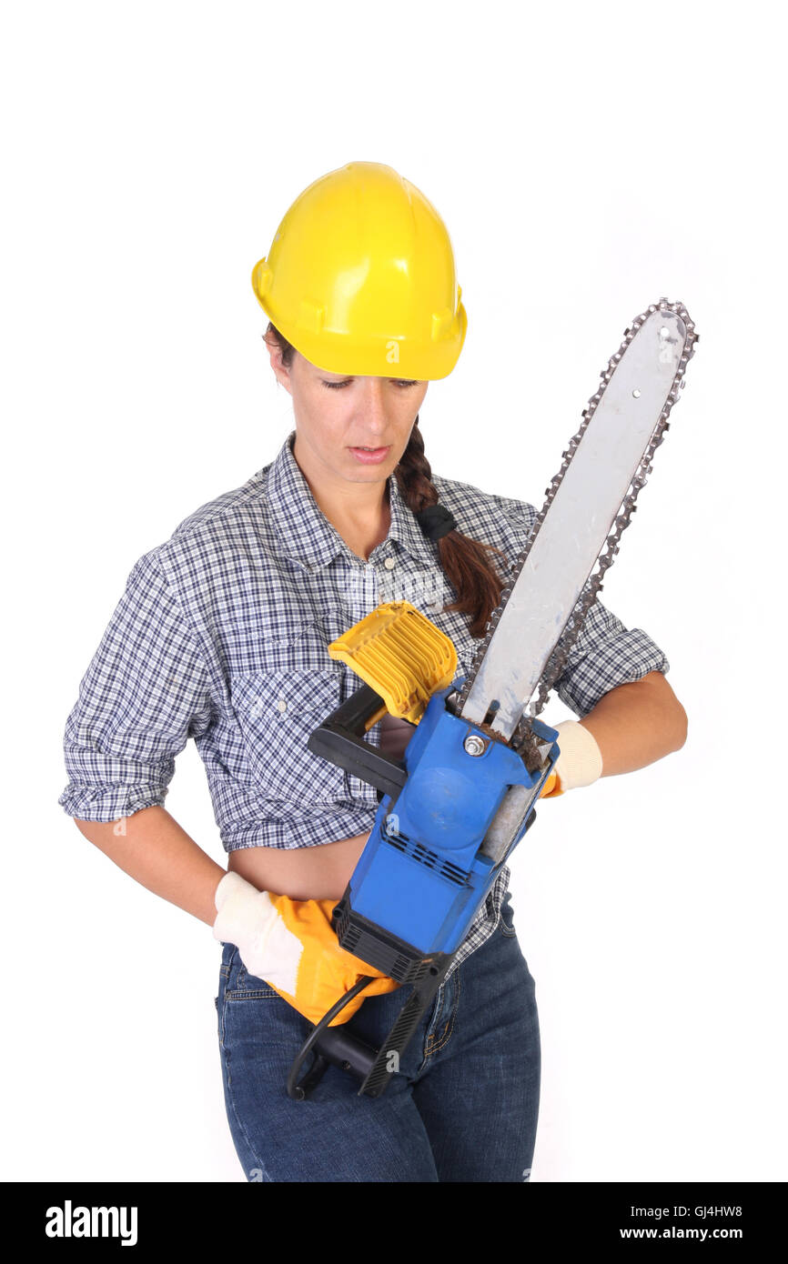 Beauty woman with chainsaw Stock Photo - Alamy