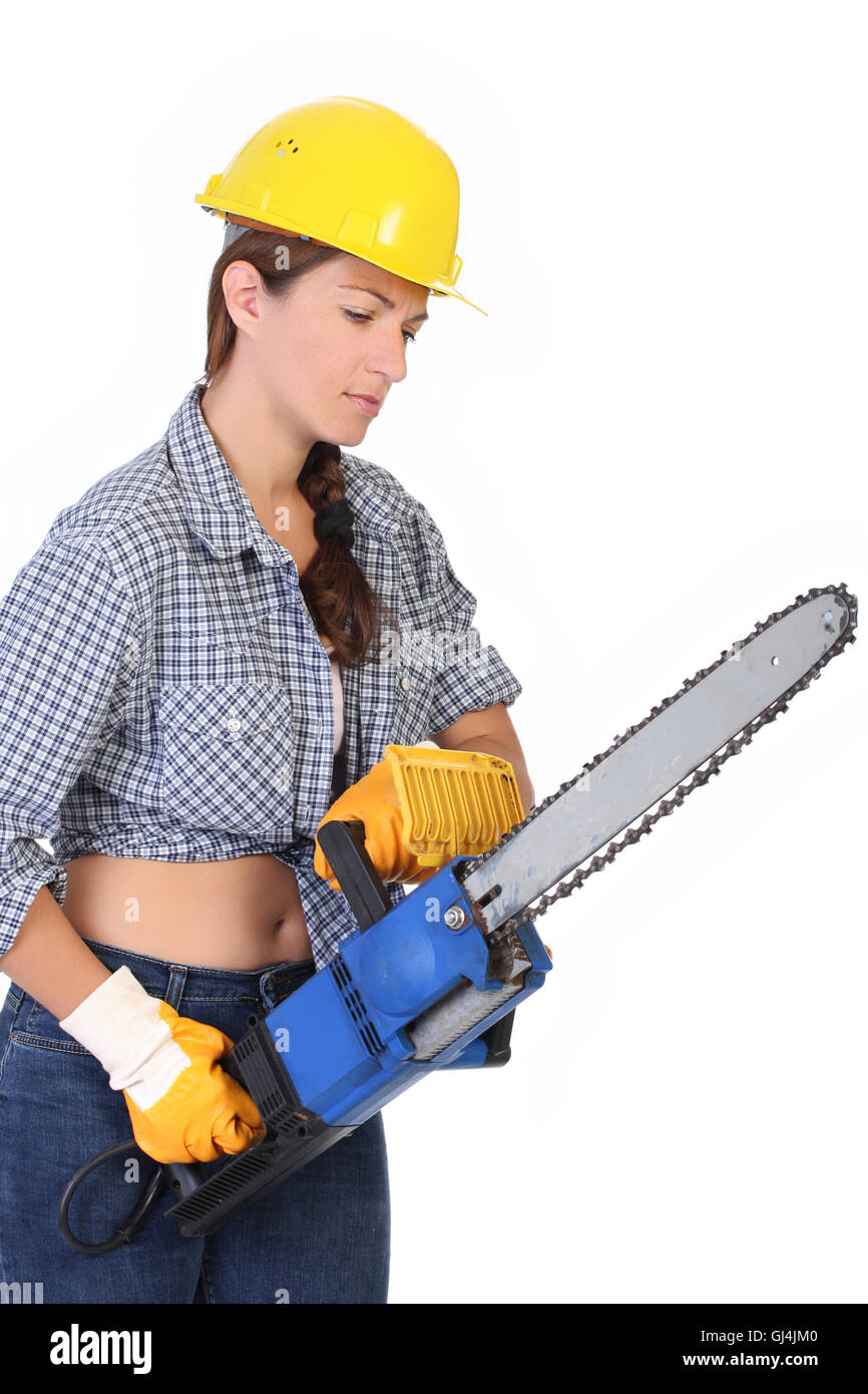 Beauty woman with chainsaw Stock Photo - Alamy