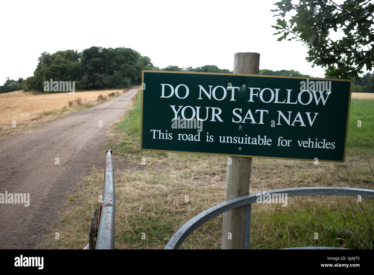 Sat Nav error warning by farm track, Warwickshire, UK Stock Photo - Alamy