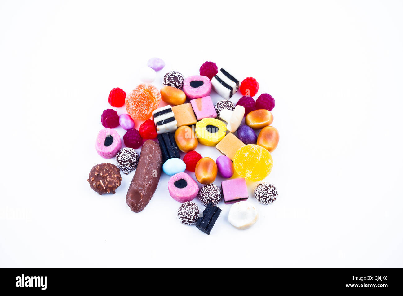 Many candy on white background.Fruit snacks Stock Photo - Alamy