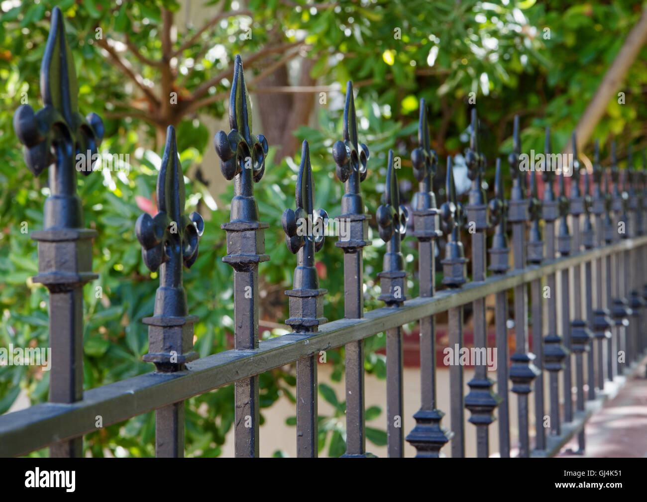 Black spike fence deeper dof Stock Photo - Alamy