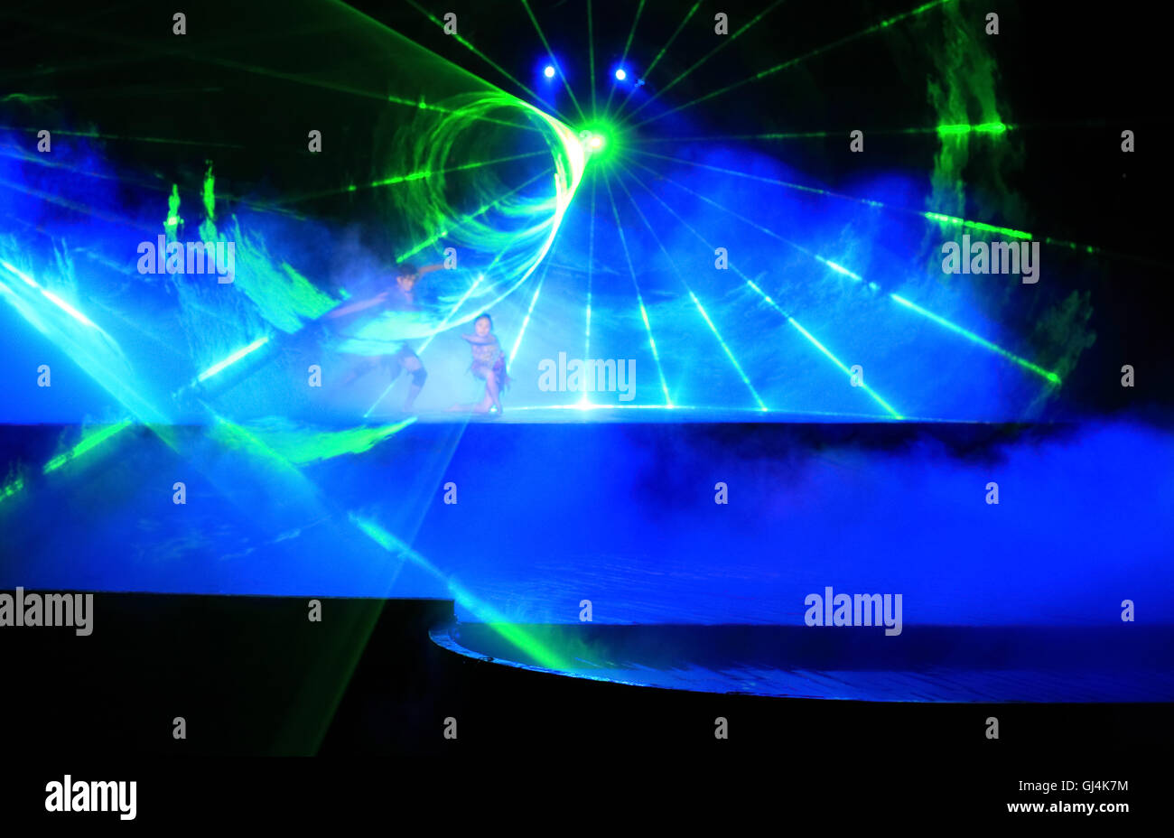 a laser light effect in a performance Stock Photo - Alamy