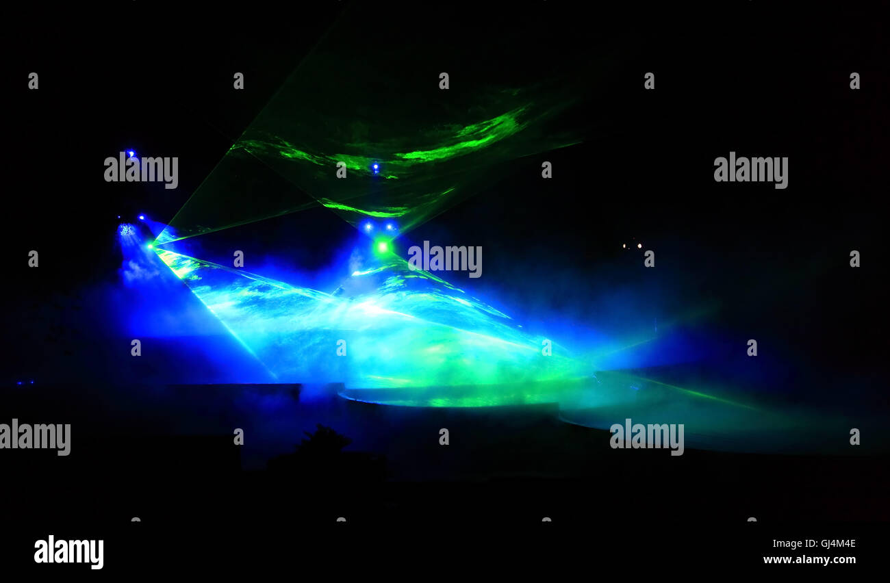 a laser light effect in a performance Stock Photo - Alamy