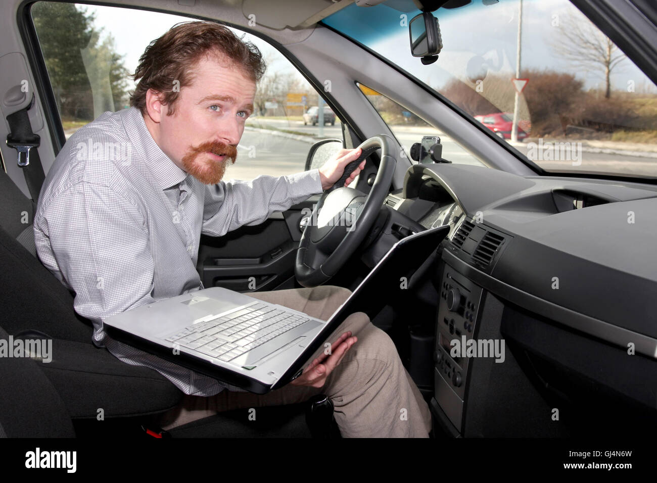 driver using gps laptop Stock Photo - Alamy