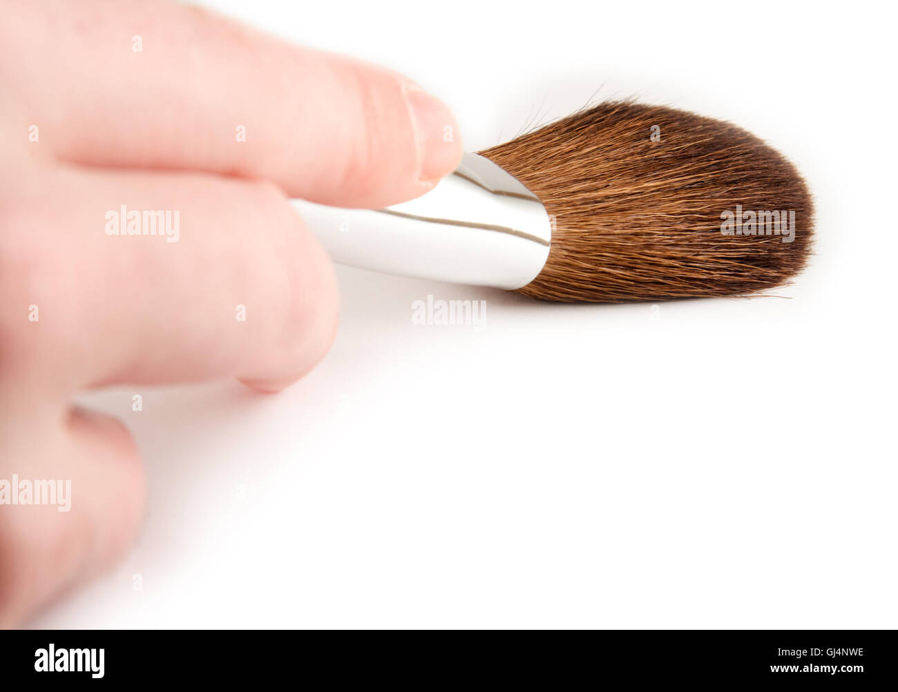 Hand brushing hi-res stock photography and images - Alamy