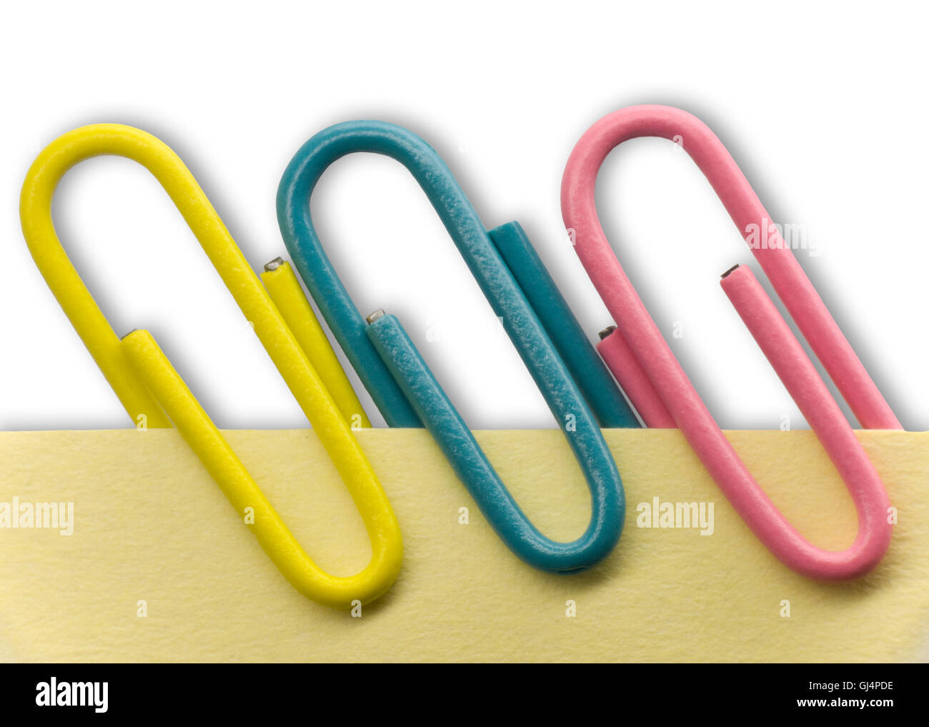 Paperclip on a note Stock Photo - Alamy