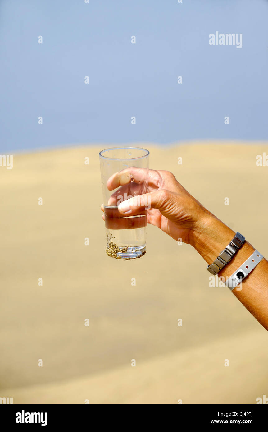 Hand reaching for water Stock Photo - Alamy