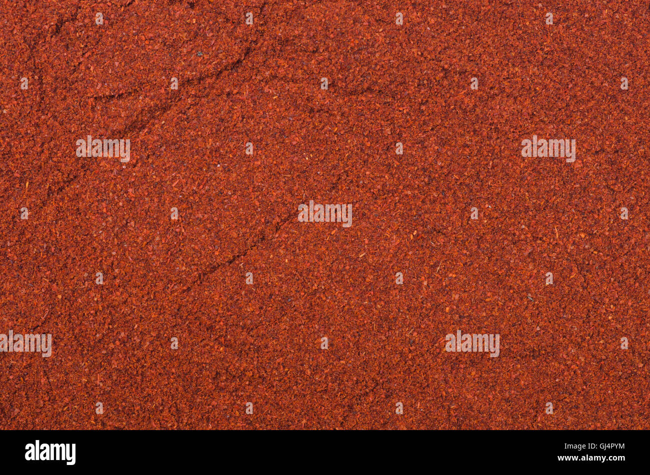 dried red pepper spice background texture Stock Photo - Alamy
