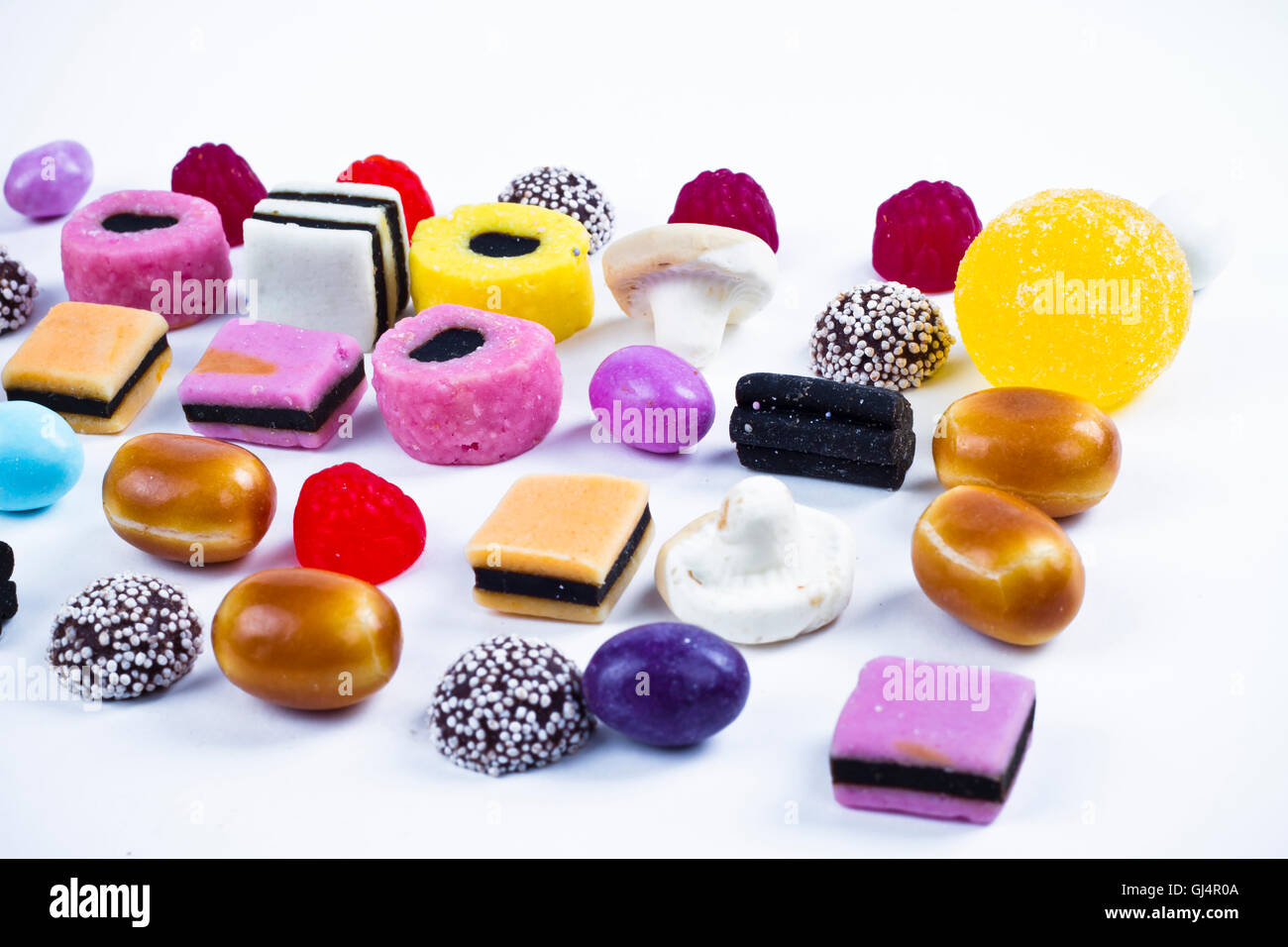 Many candy on white background.Fruit snacks Stock Photo - Alamy