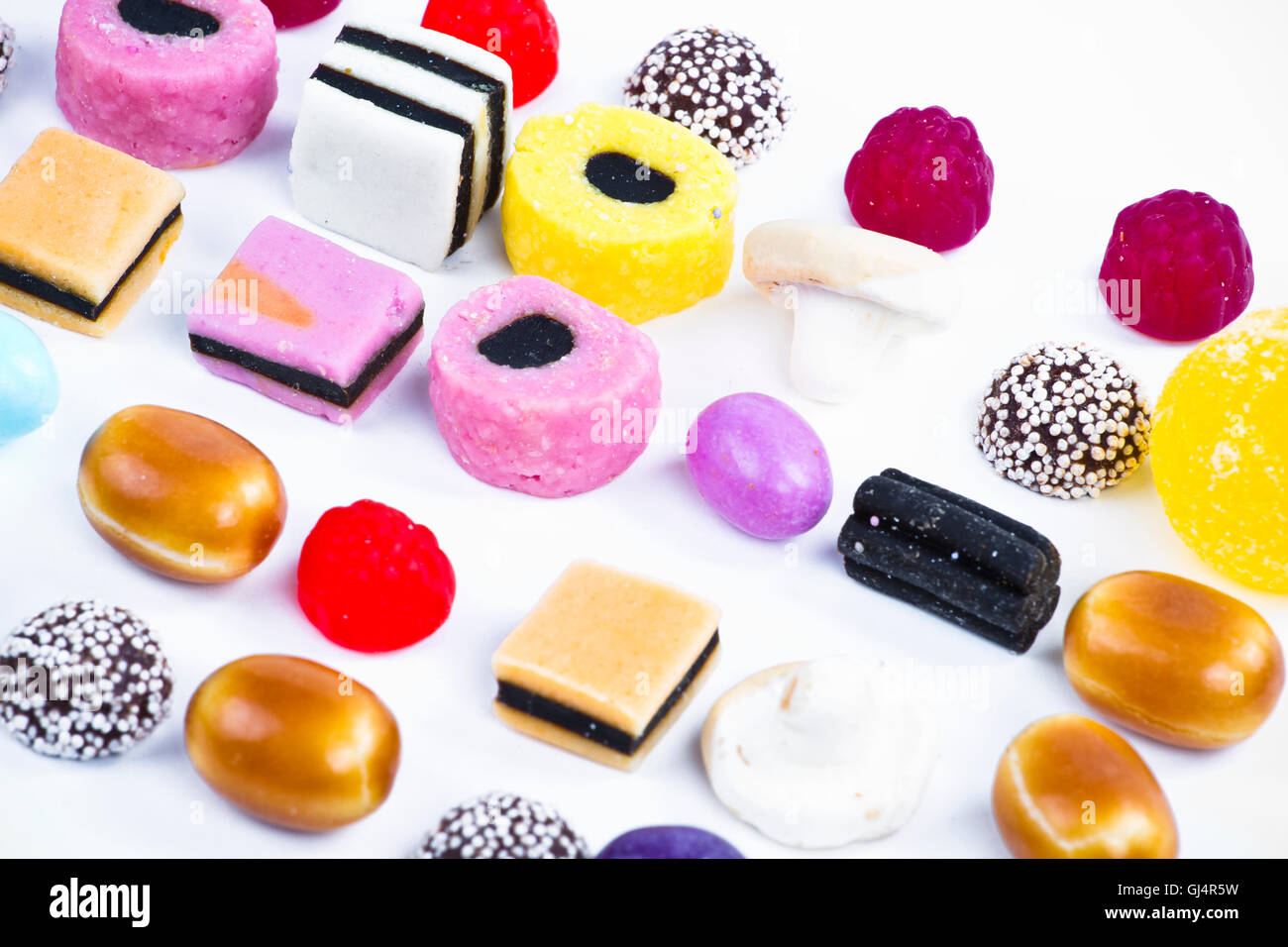 Many candy on white background.Fruit snacks Stock Photo - Alamy