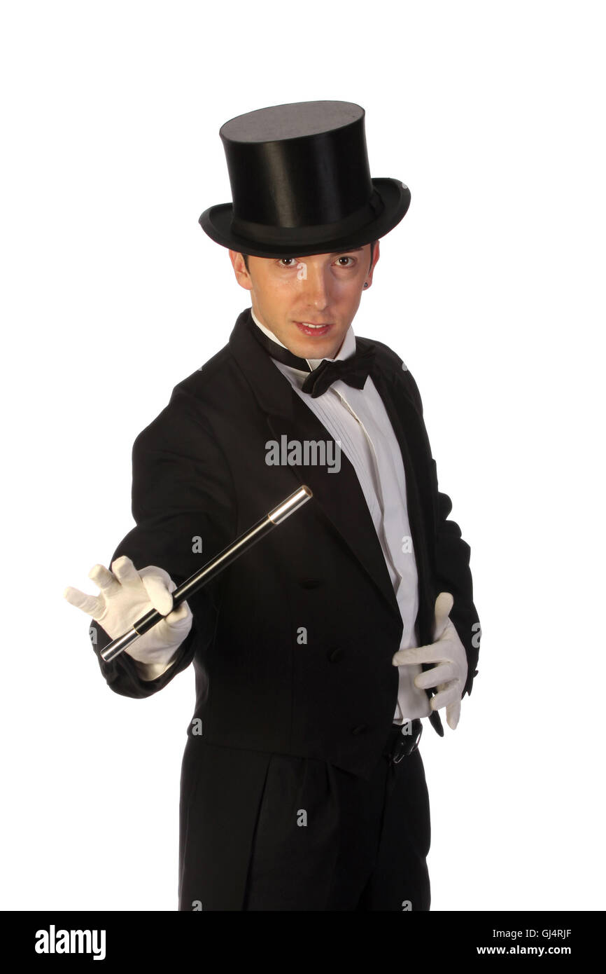 young magician performing with wand Stock Photo - Alamy