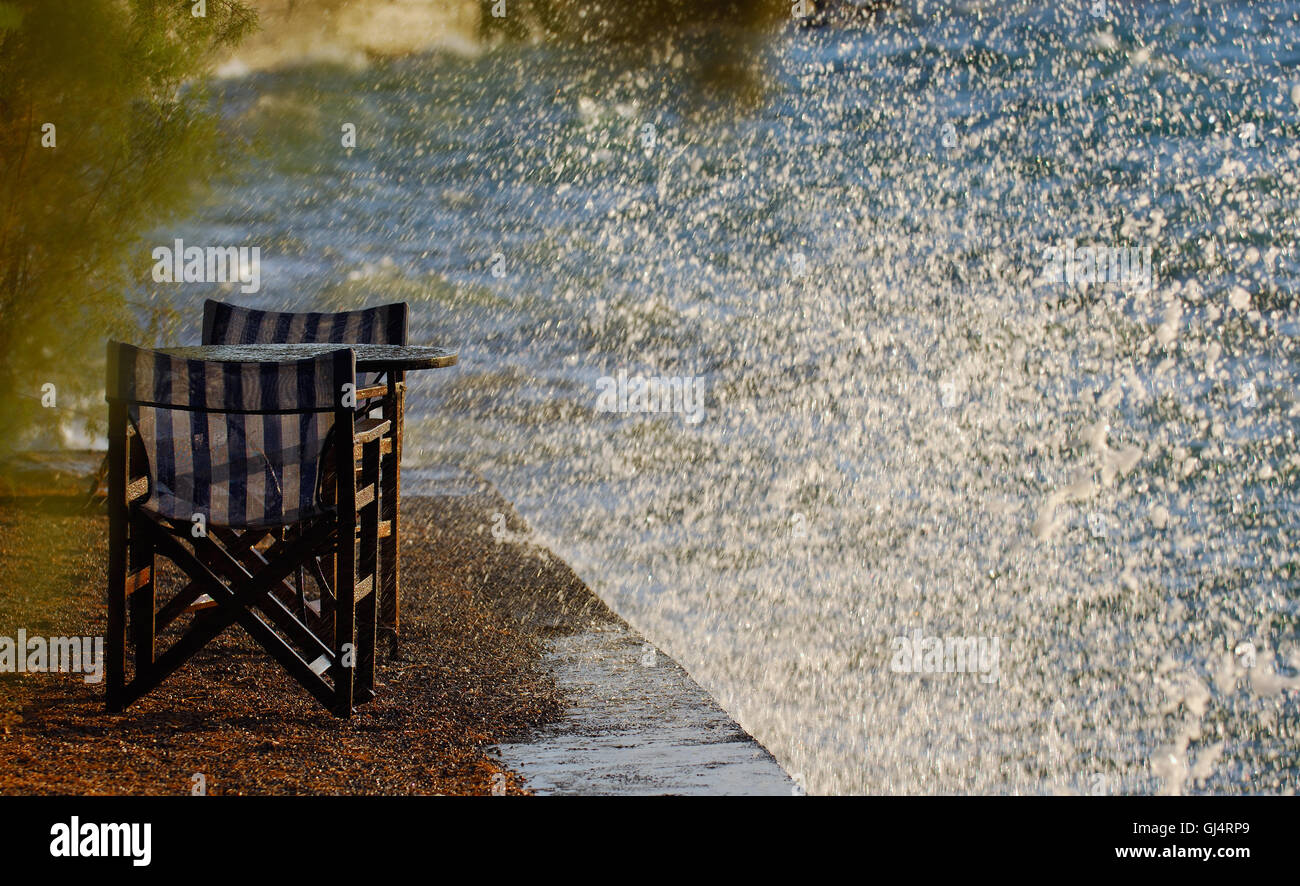 Tables and waves splash Stock Photo - Alamy