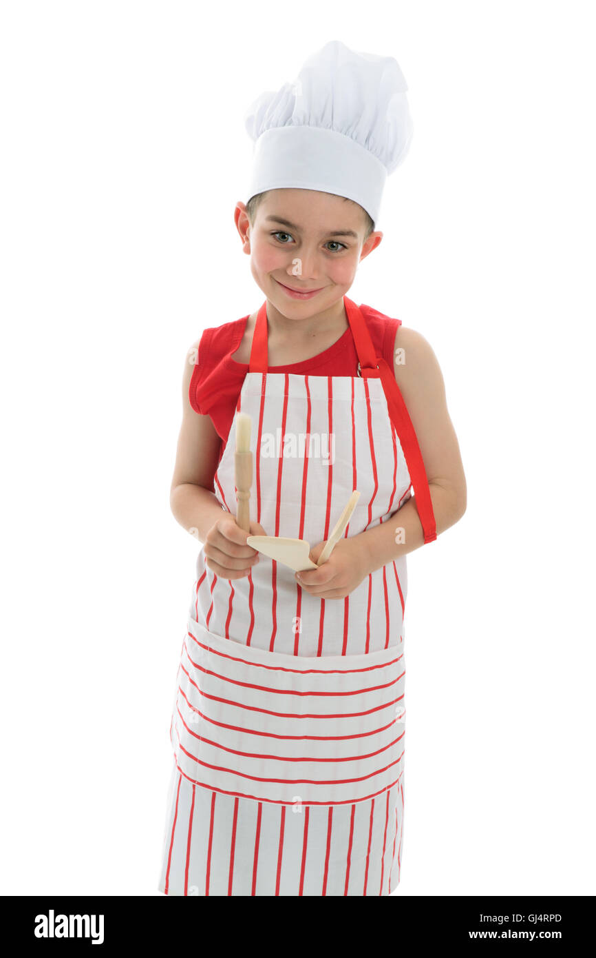 Smiling chef holding kitchen utensils Stock Photo - Alamy