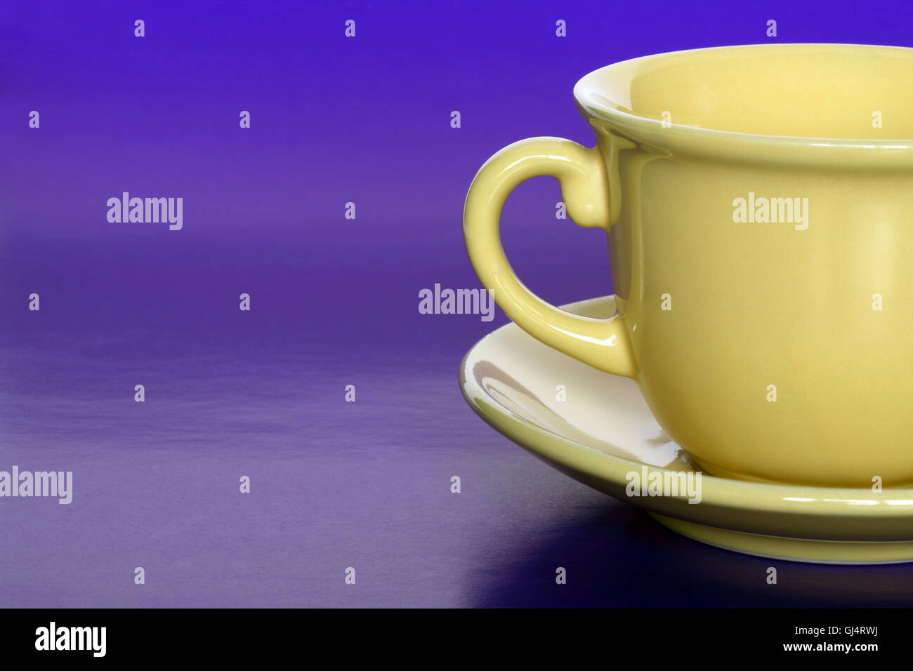 Yellow Empty Cup Stock Photo - Alamy
