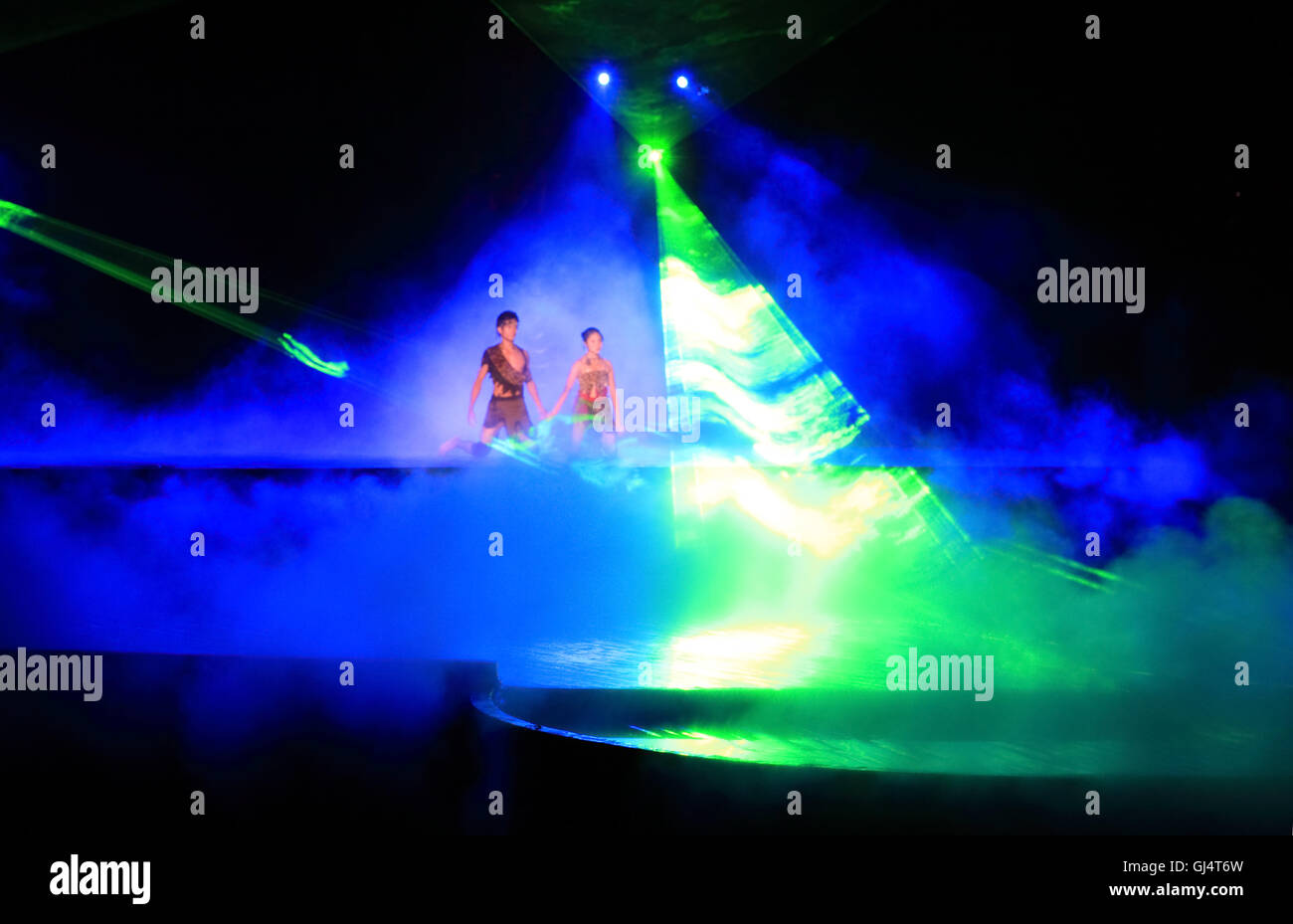 a laser light effect in a performance Stock Photo - Alamy