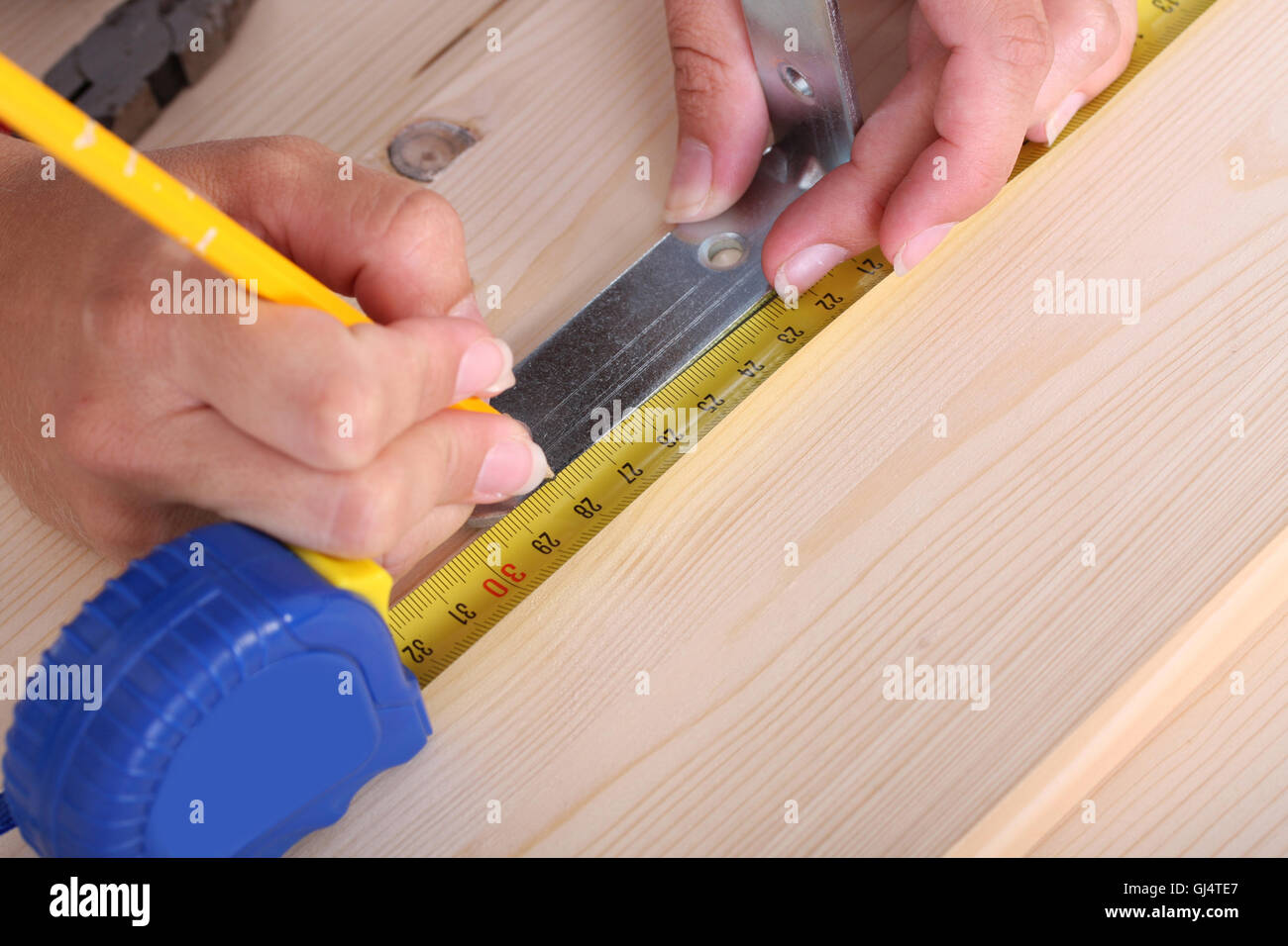 wooden plank and measuring tape Stock Photo - Alamy