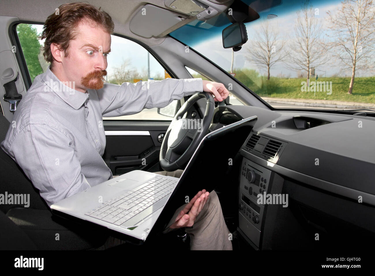 driver using gps laptop Stock Photo - Alamy