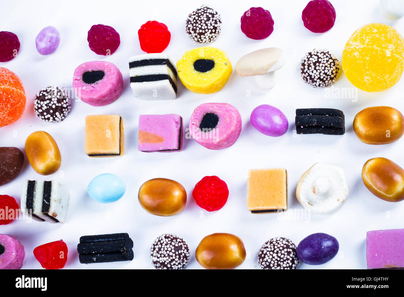 Many candy on white background.Fruit snacks Stock Photo - Alamy