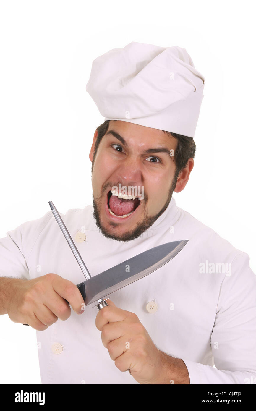 Mad chef sharpening a knife Stock Photo - Alamy