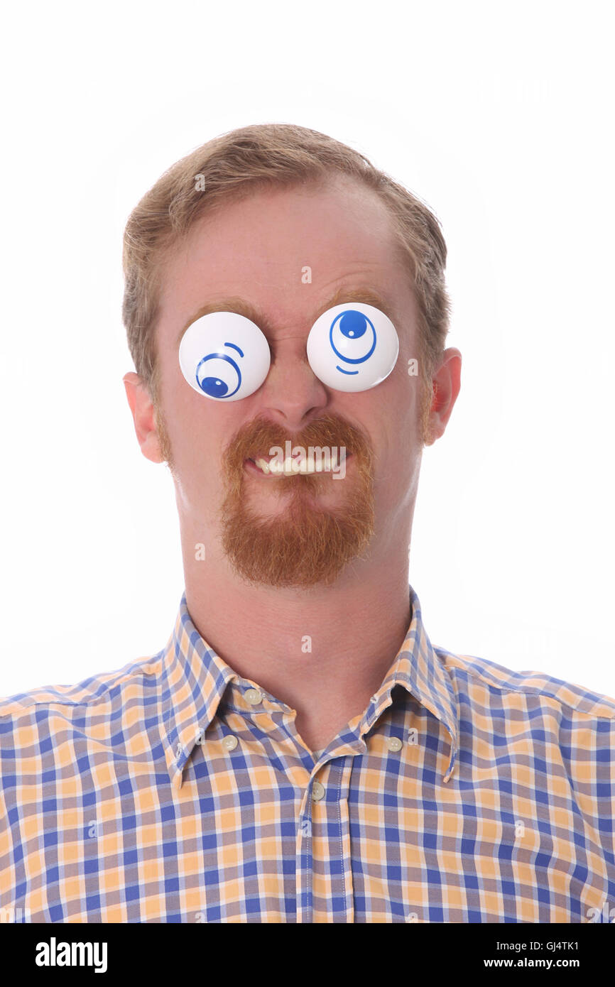 Very funny young man with toys Stock Photo - Alamy