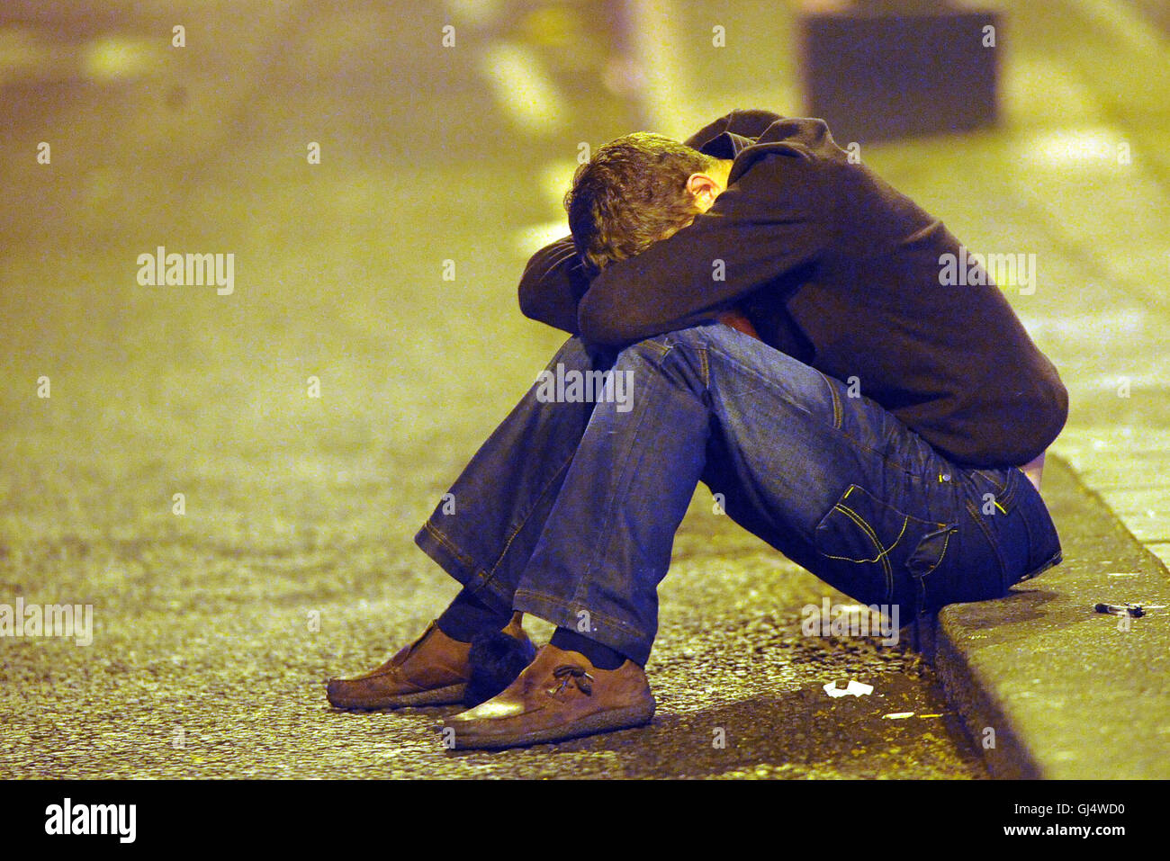 Drunk reveler on a night out in Cardiff, South Wales Stock Photo - Alamy