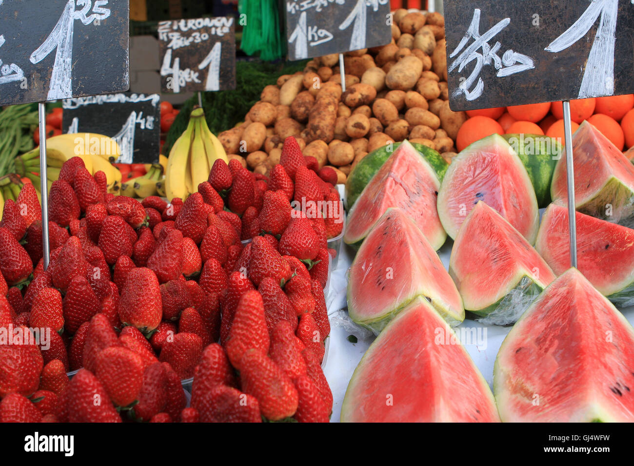 Fruit stand with Strawberries and watermelon Stock Photo - Alamy