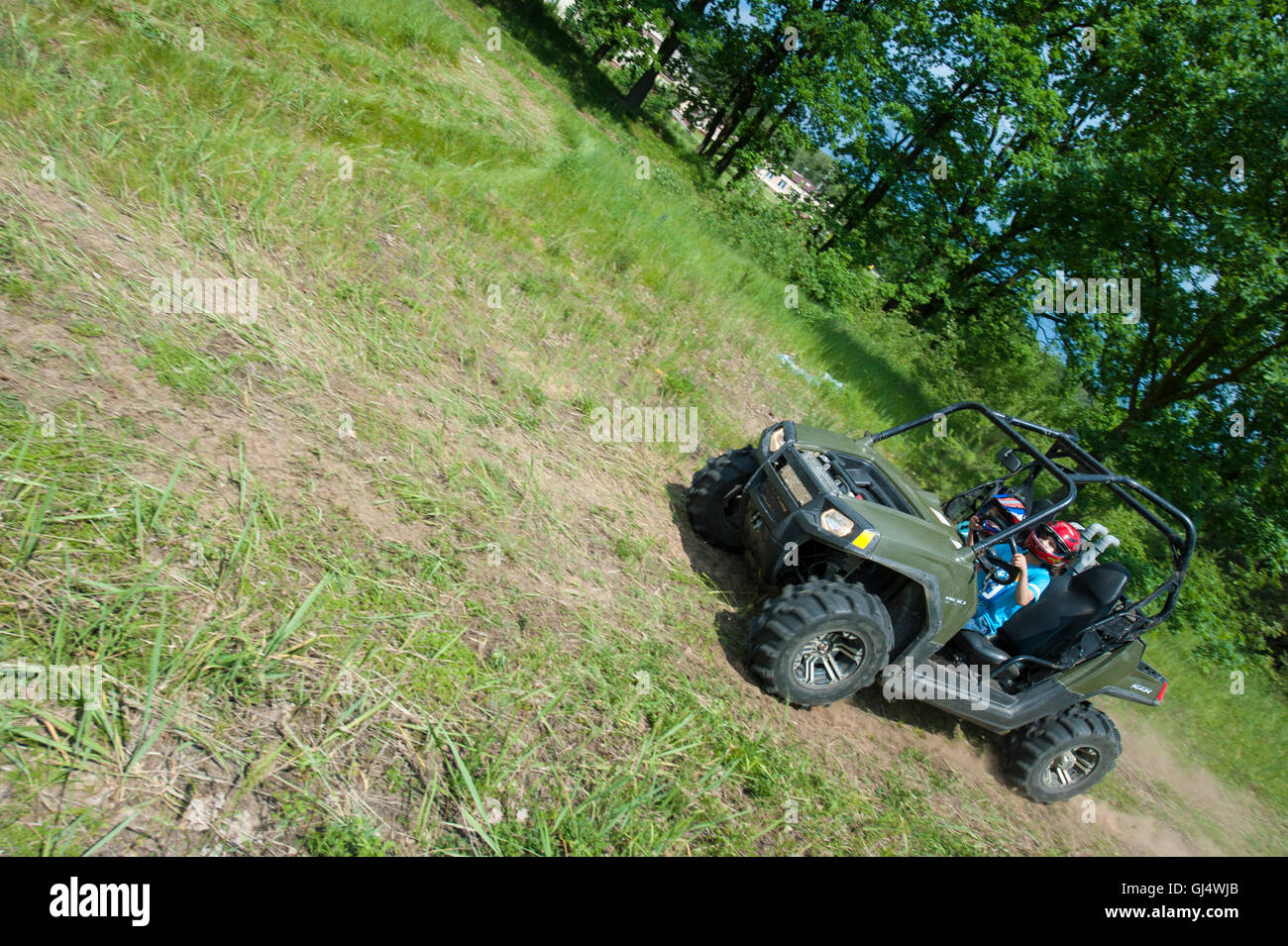 Off-road vehicles on display and in action during a summer public event ...