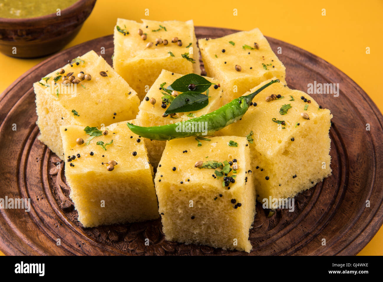 favourite Gujrati snack, khaman Dhokla made up of gram flour, semolina ...