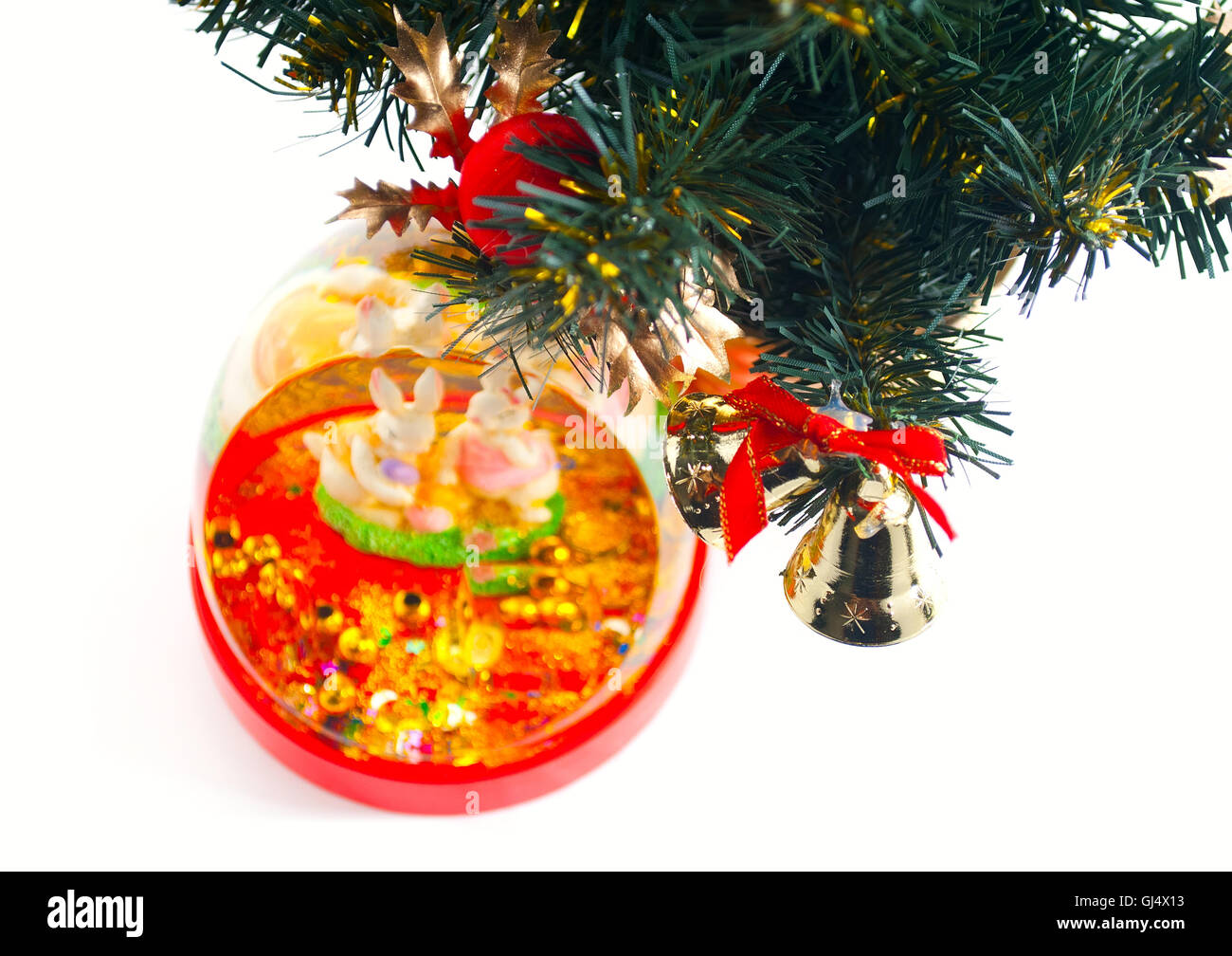 Cute christmas bunny under tree hi-res stock photography and images - Alamy