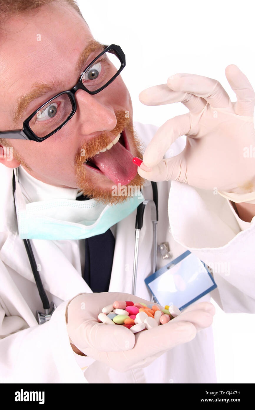 doctor taking hand full of tablets Stock Photo - Alamy