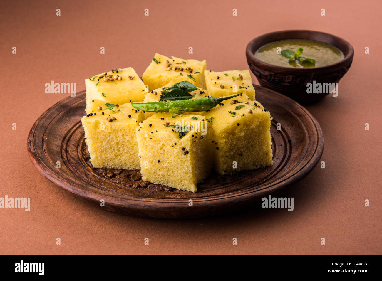 favourite Gujrati snack, khaman Dhokla made up of gram flour, semolina ...