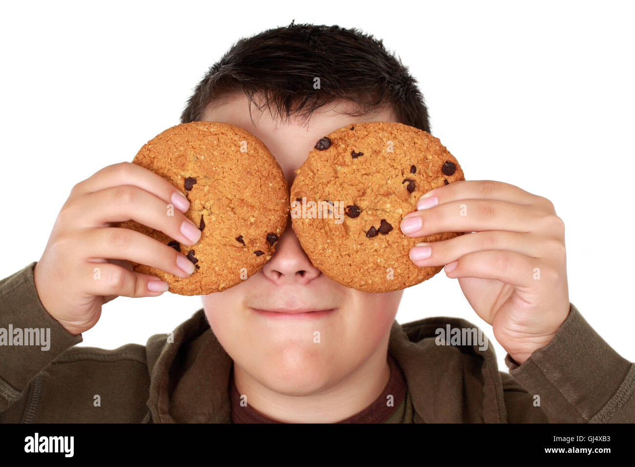 teen boy with cookies Stock Photo - Alamy