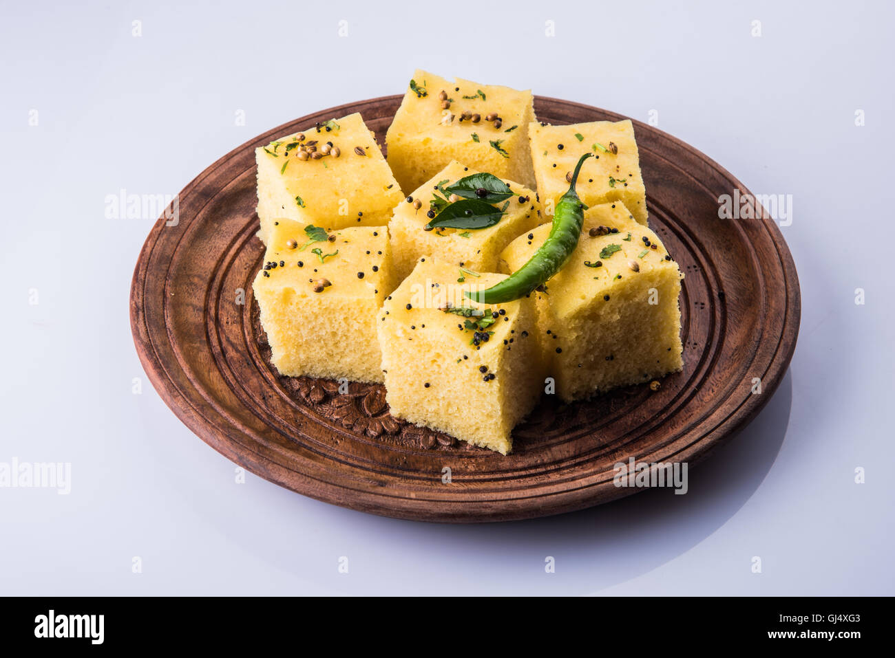 favourite Gujrati snack, khaman Dhokla made up of gram flour, semolina ...
