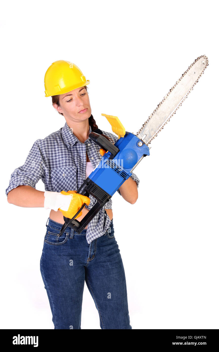 Beauty woman with chainsaw Stock Photo - Alamy