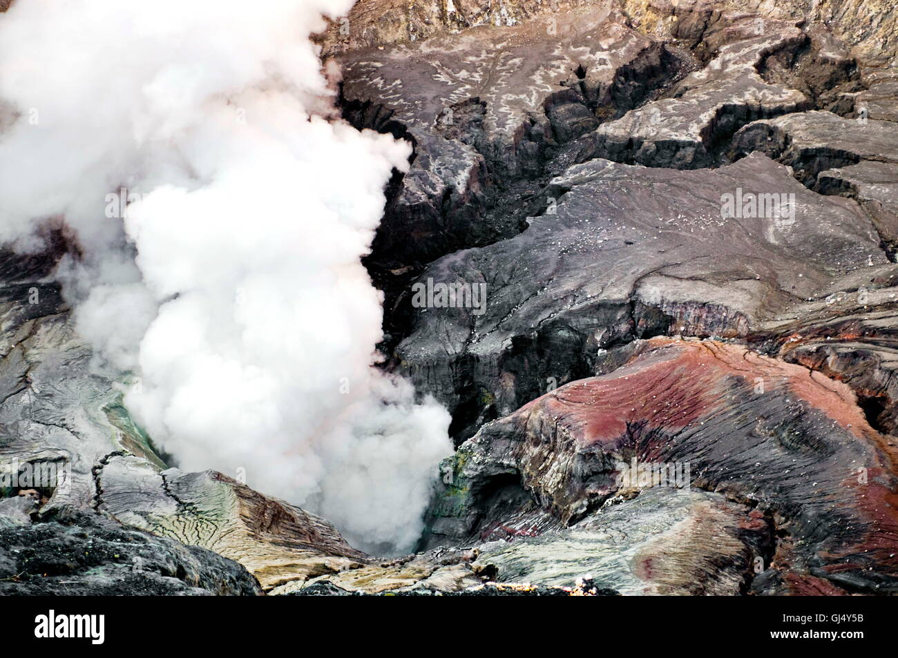 Smoking creater volcano Stock Photo - Alamy