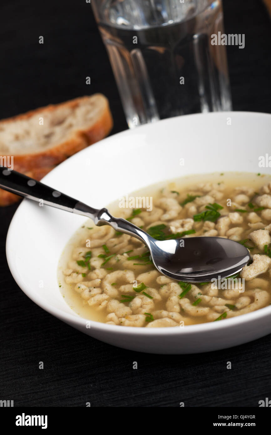bavarian soup with a spoon Stock Photo - Alamy
