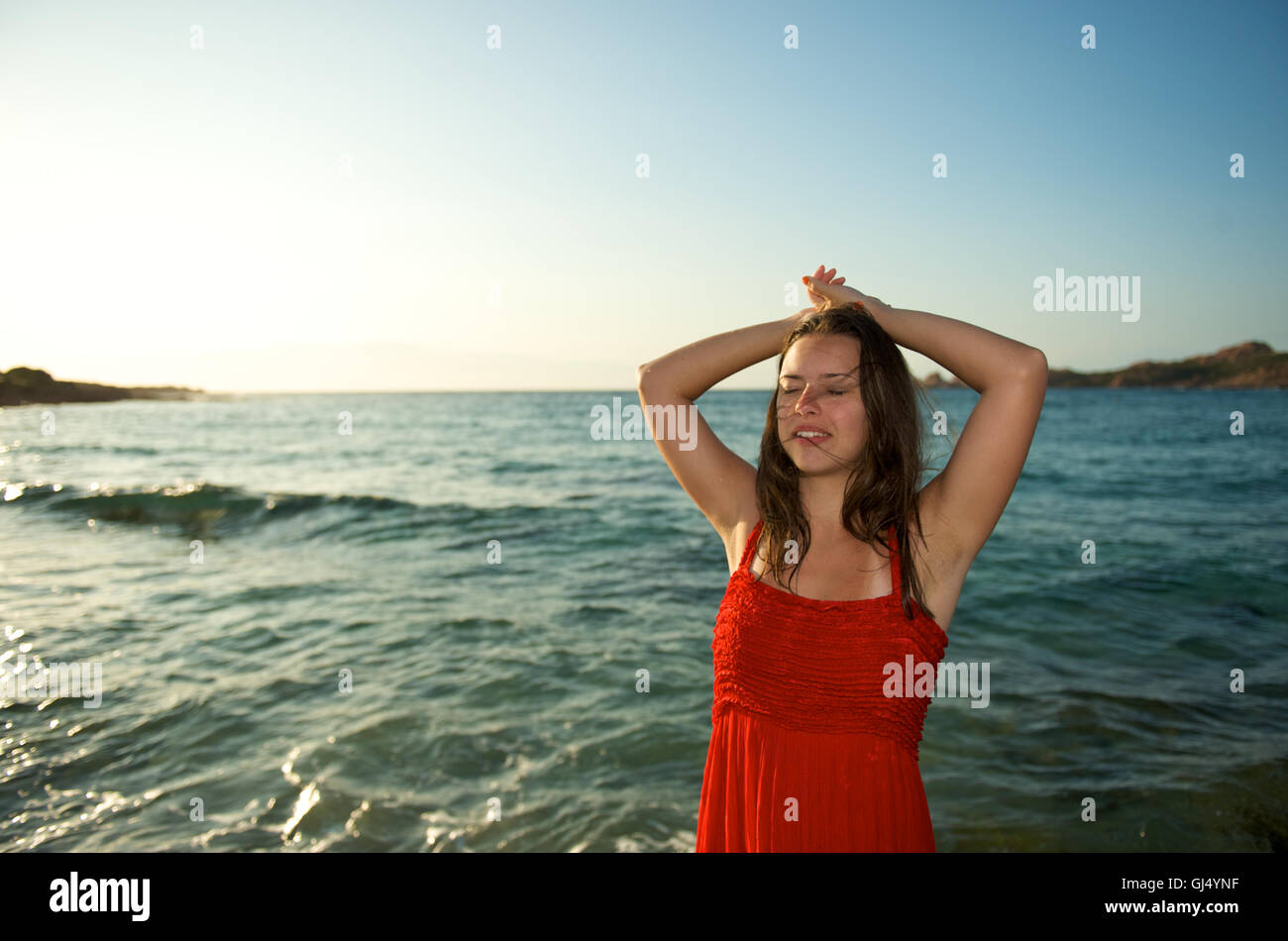 Beauty woman relaxing on the beach Stock Photo - Alamy