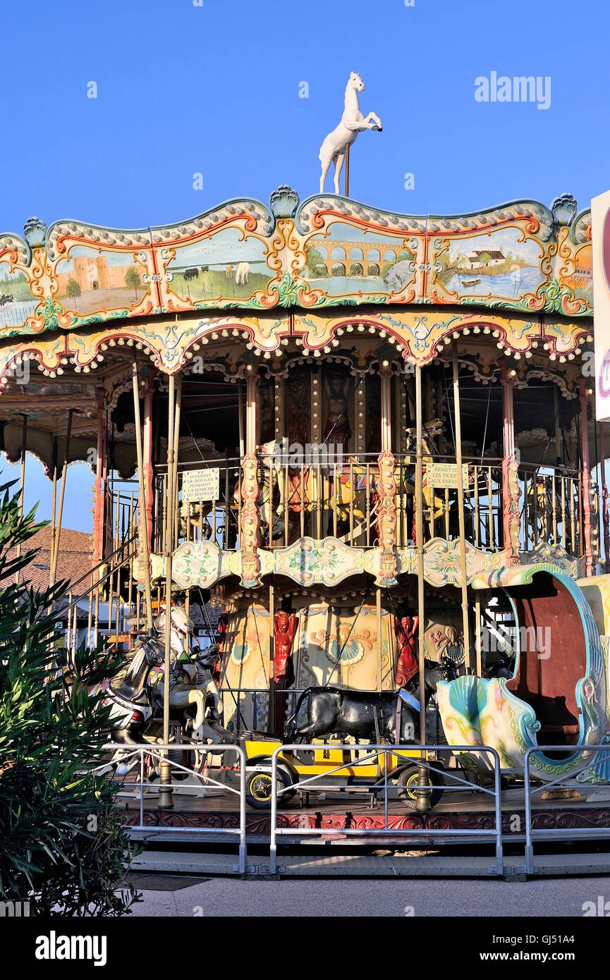 carousel with wooden horses decoration typical Camargue Saintes-Maries ...