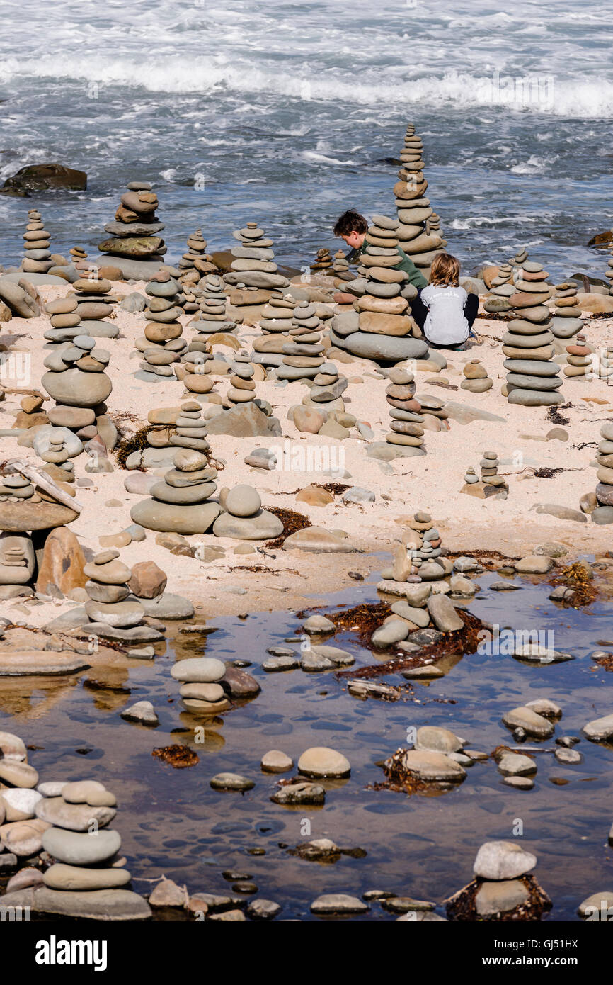 Rock stacking at Carisbrook Creek along the Great Ocean Road Stock ...